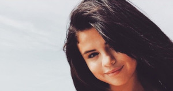 Selena Gomez Shows Off Cleavage In Swimsuit Shot Shares Inspirational